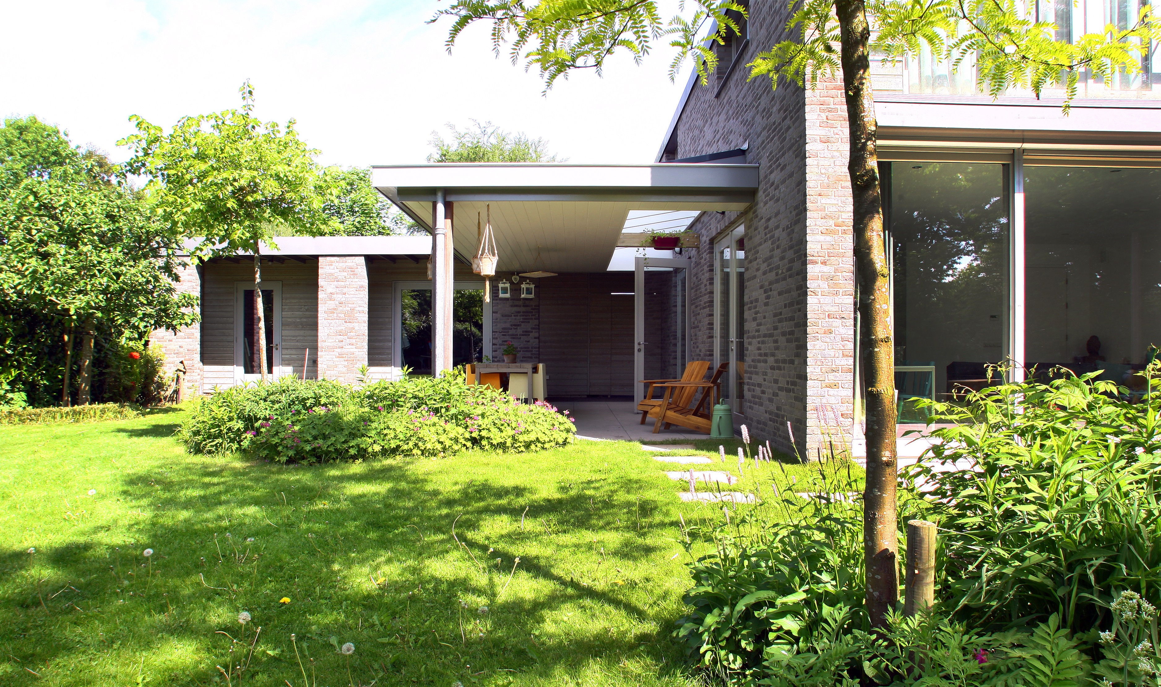 Veranda met grote overspanning in Berghem - Van der Heijden